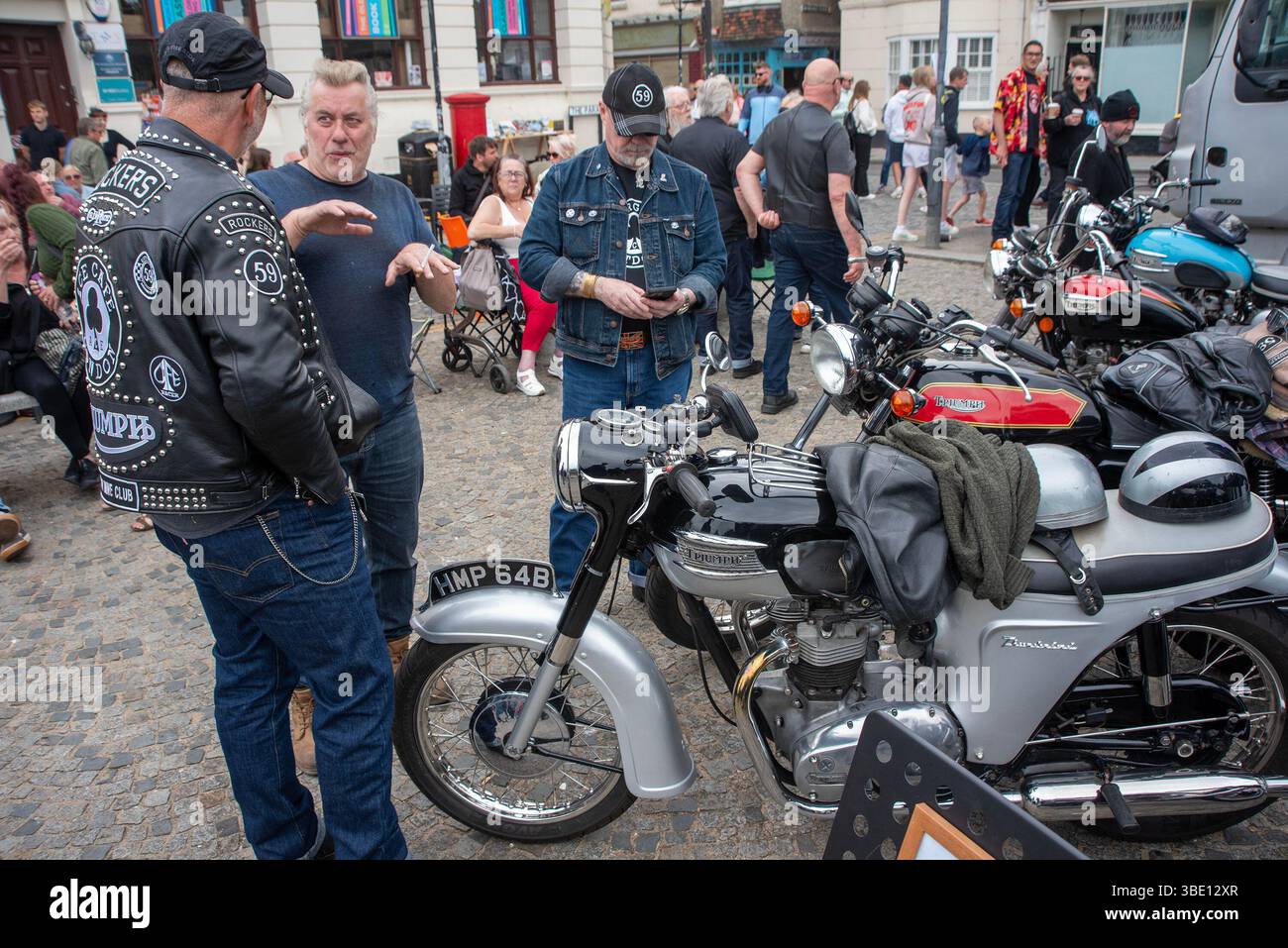 Margate, UK. 26th May, 2025. Rockers have a conversation infront of a ...