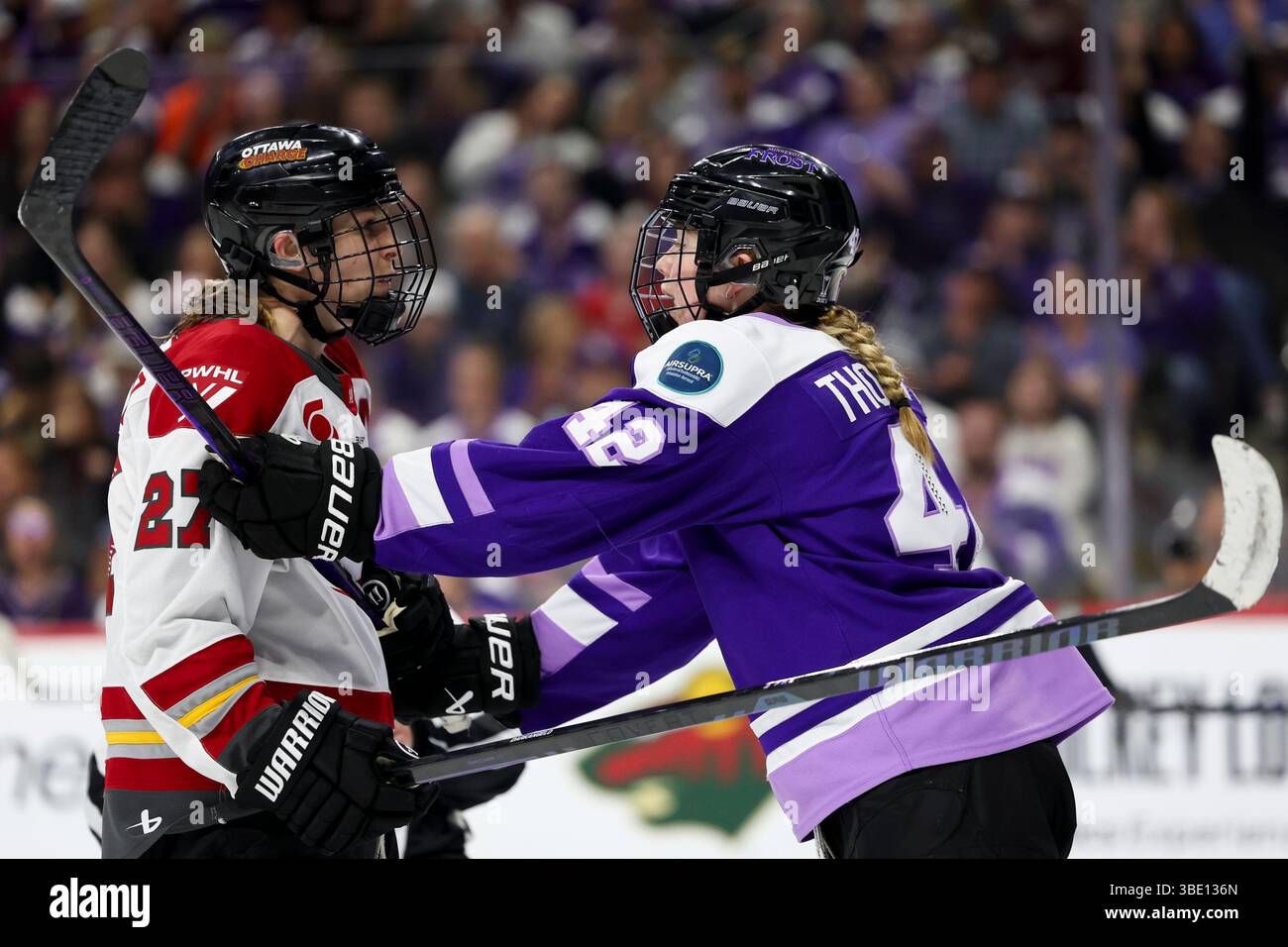 Minnesota Frost defenseman Claire Thompson (42) pushes away Ottawa ...