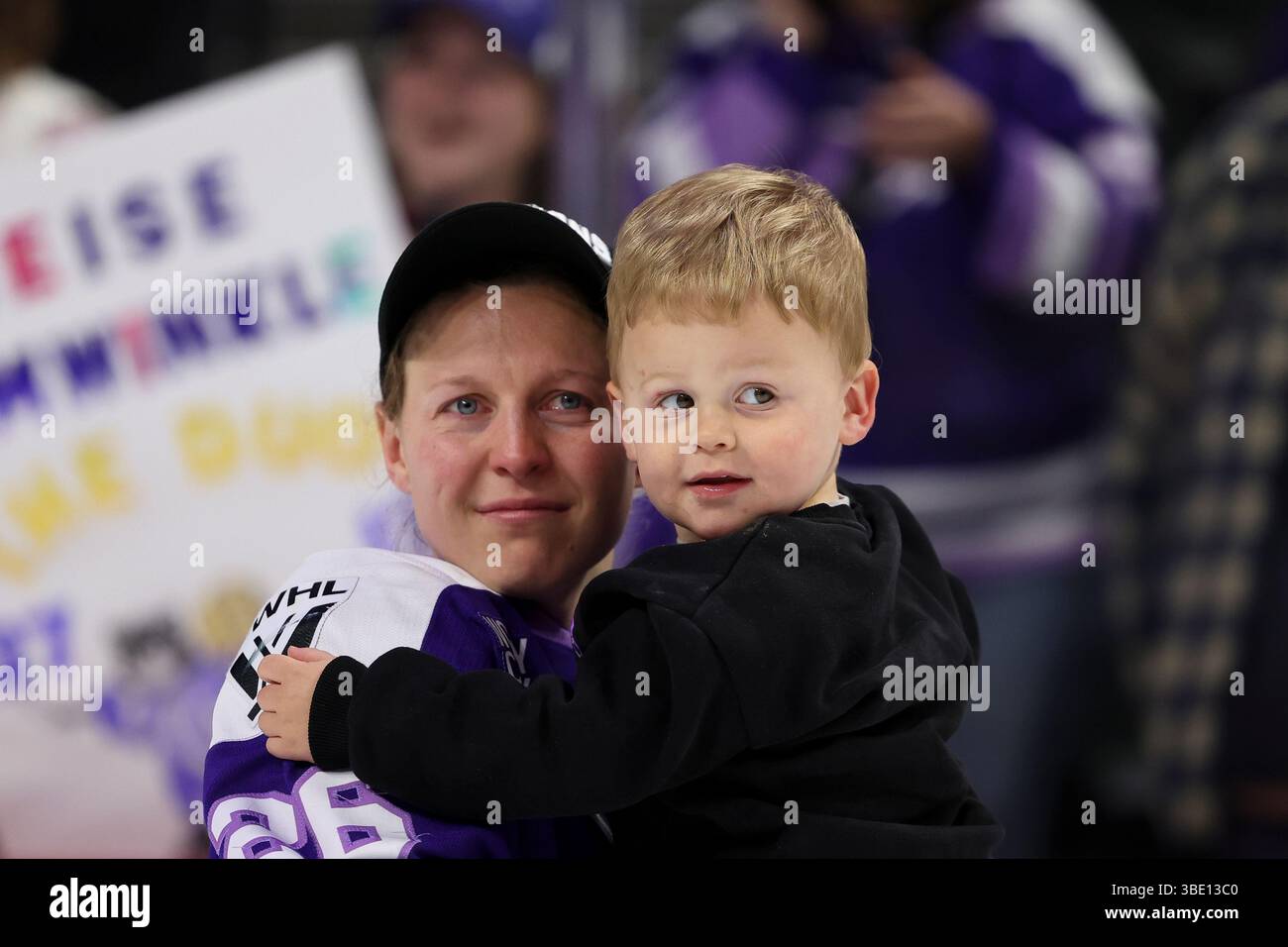 Minnesota Frost forward Kendall Coyne Schofield holds her son, Drew ...