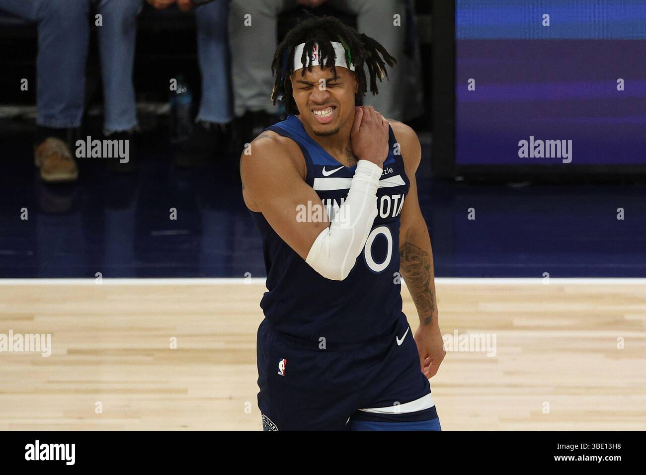Minnesota Timberwolves guard Terrence Shannon Jr. grabs his shoulder ...