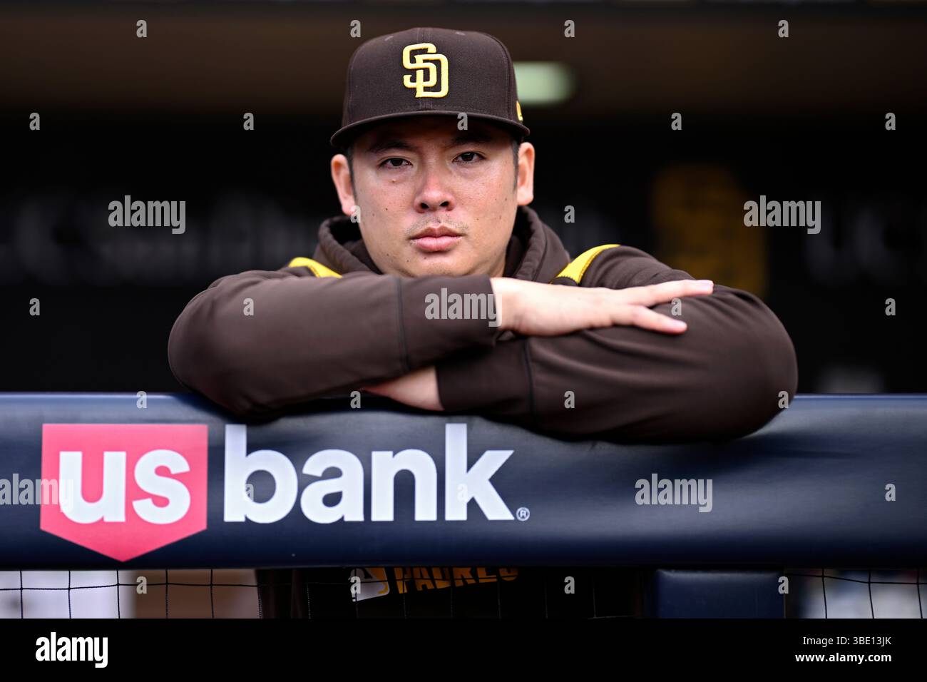 San Diego Padres' Yuki Matsui looks on from the dugout before a ...