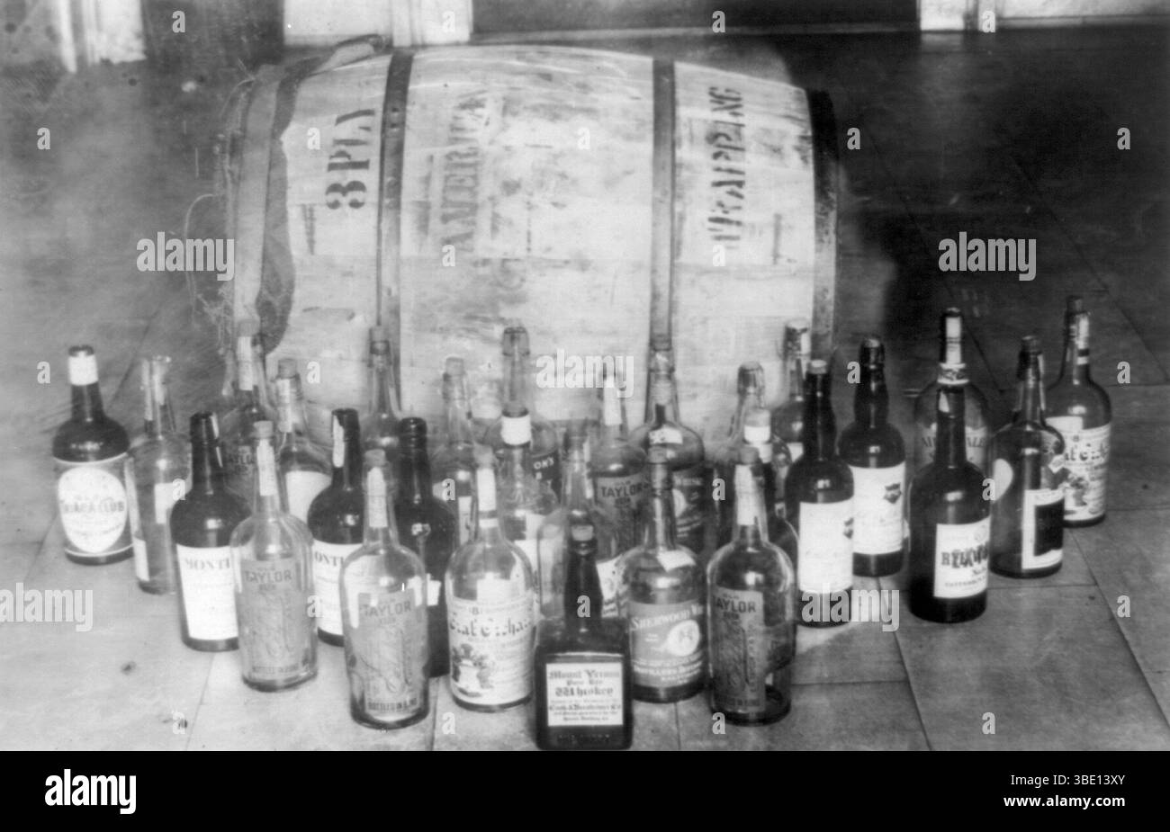 Bottles and barrel of confiscated whiskey. Between 1920 and 1933 the ...