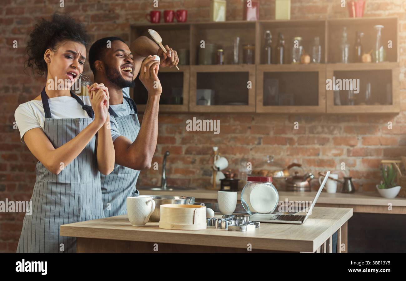 Man singing dancing preparing food hi-res stock photography and images ...