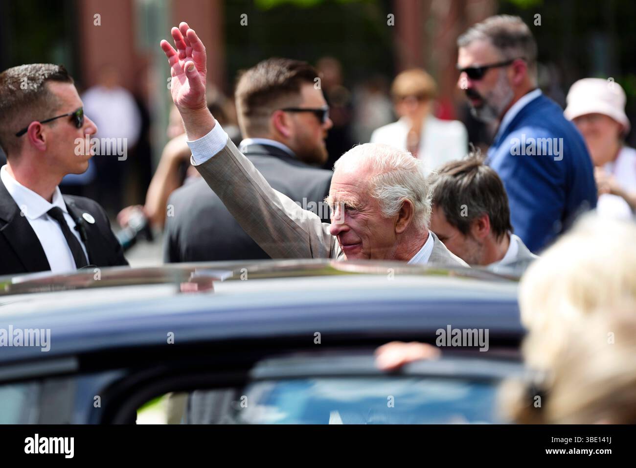 Ottawa, Can. 26th May, 2025. King Charles waves to the crowd as he ...