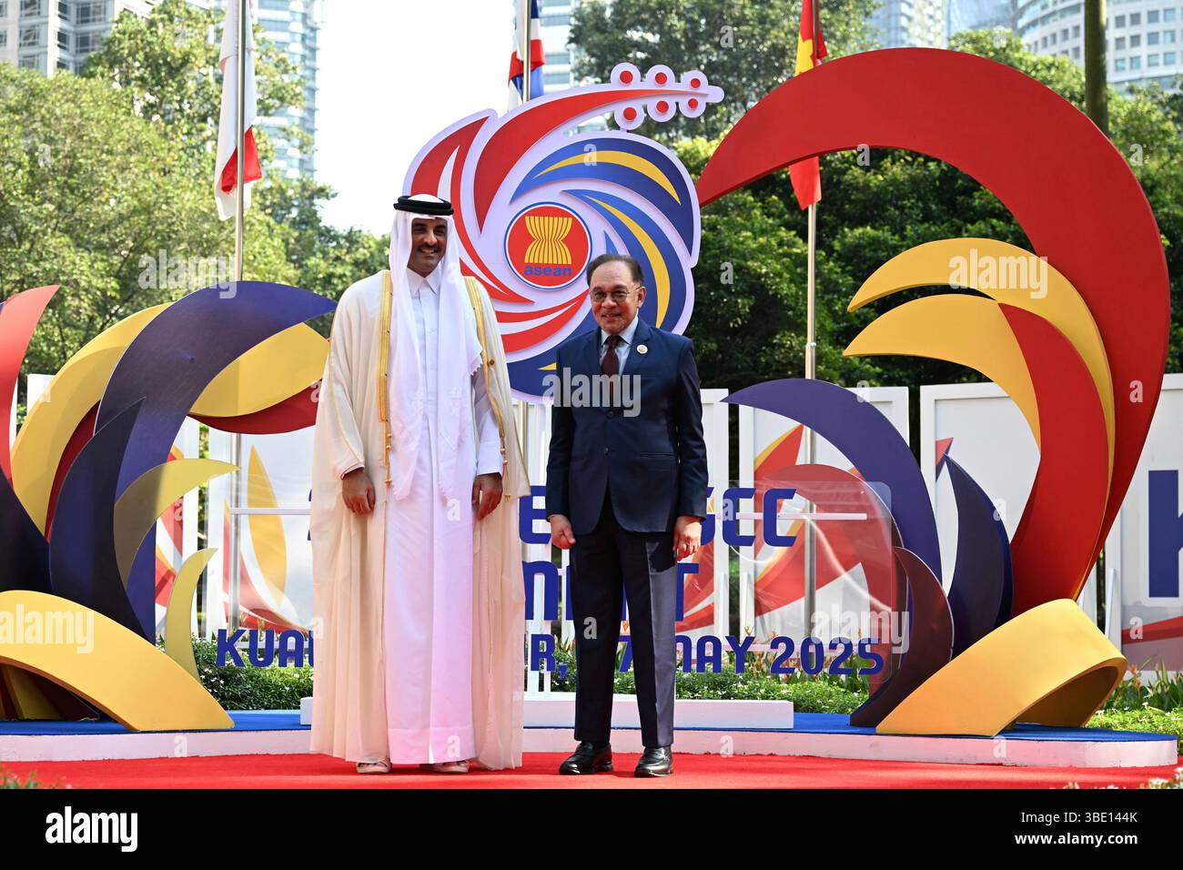 Malaysia's Prime Minister Anwar Ibrahim, right, poses with Emir of Qatar Sheikh Tamim bin Hamad ...