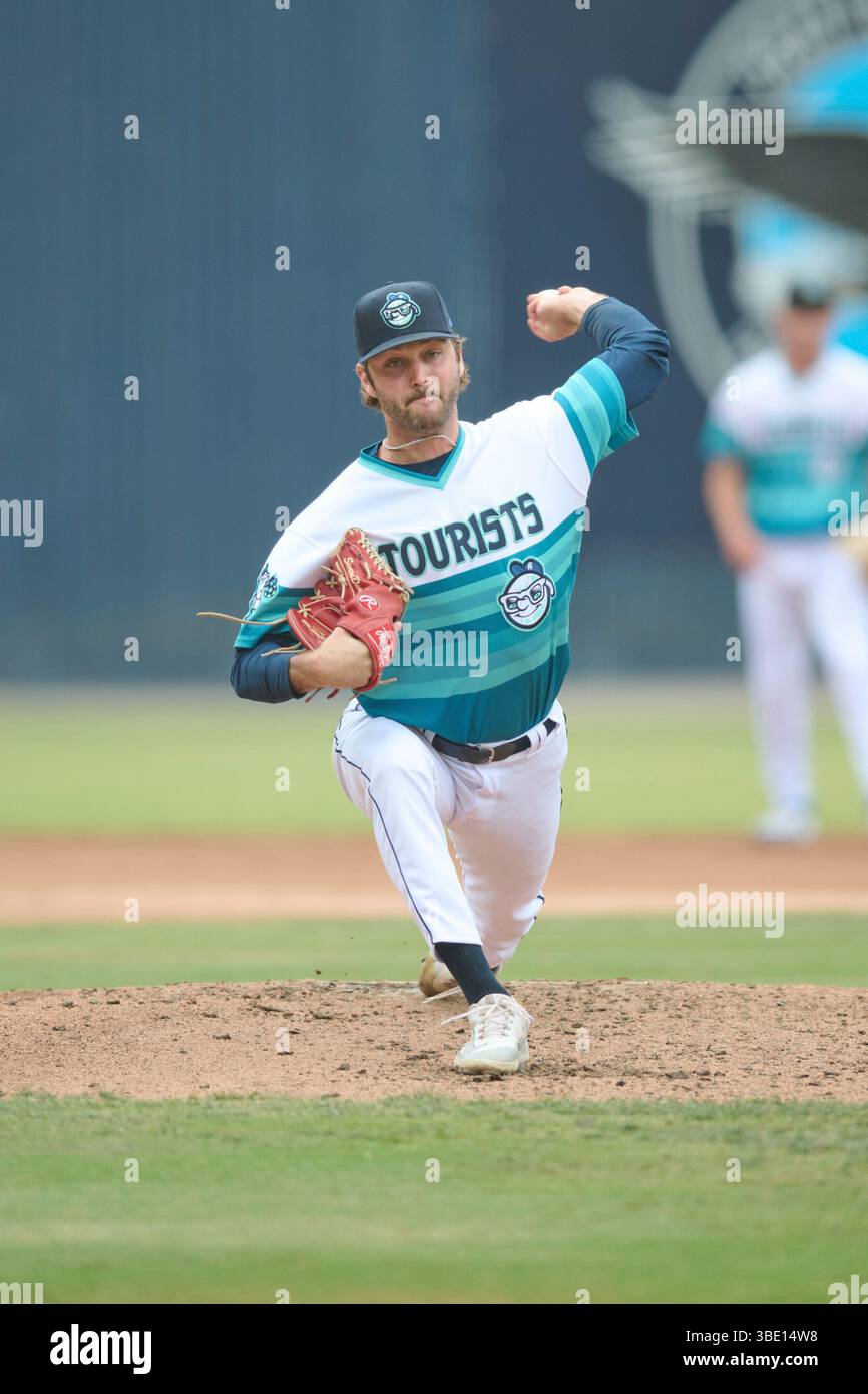 Asheville Tourists pitcher Nick Swiney (26) delivers a pitch during a game against the ...