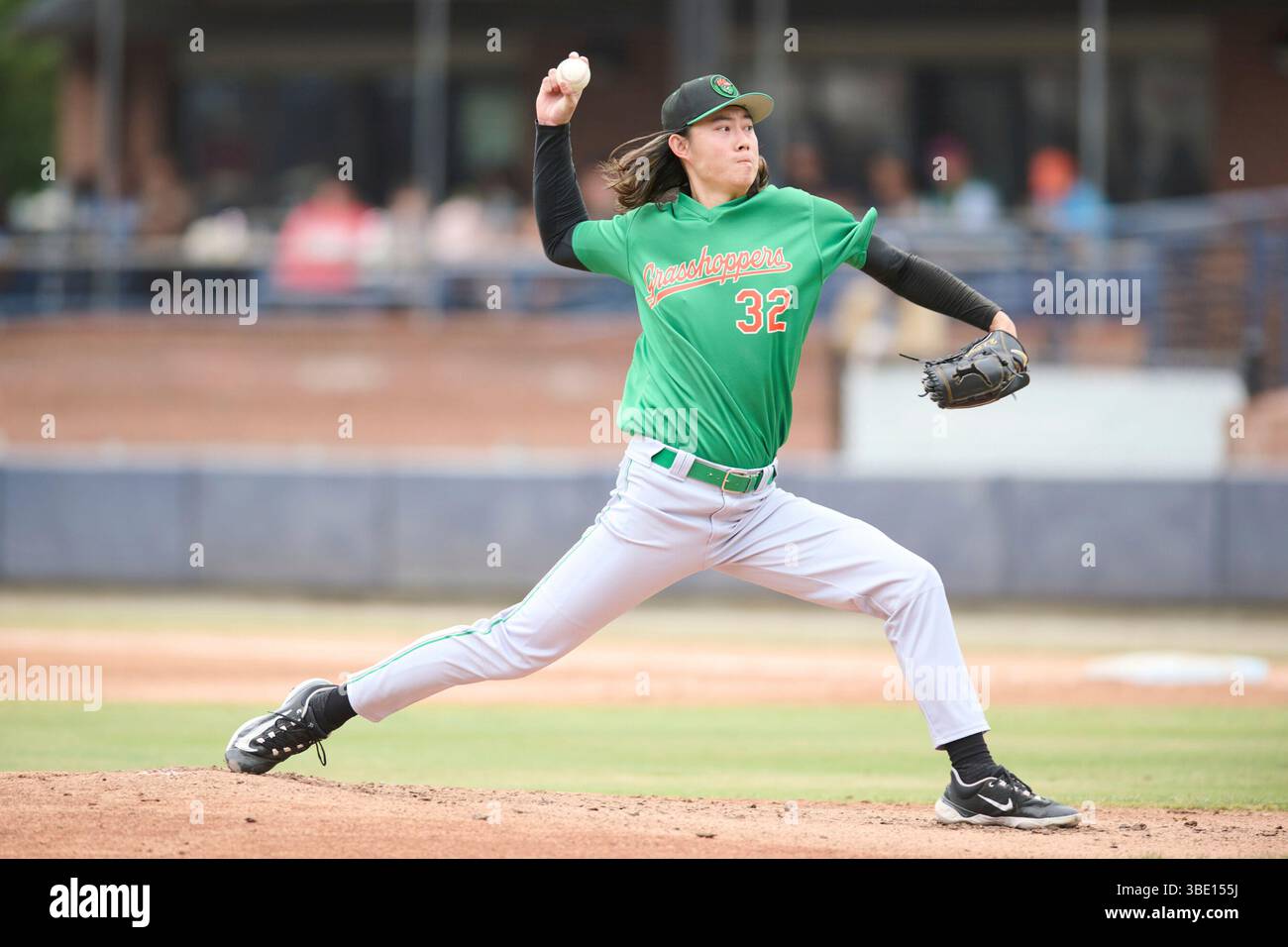 Greensboro Grasshoppers starting pitcher Hung-Leng Chang (32) delivers ...