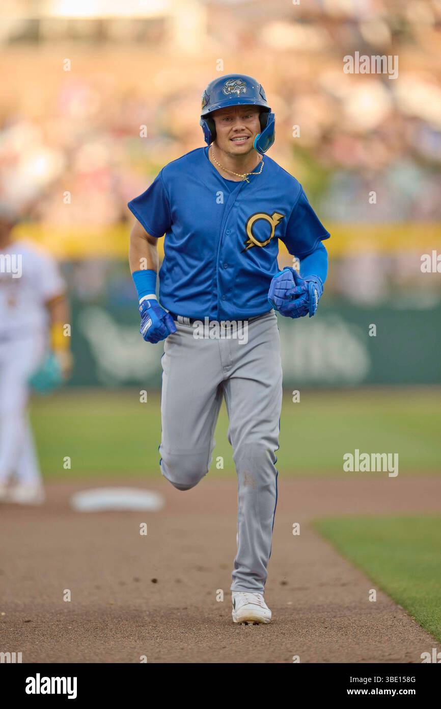 Omaha Storm Chasers second baseman Diego Castillo (9) comes off the ...