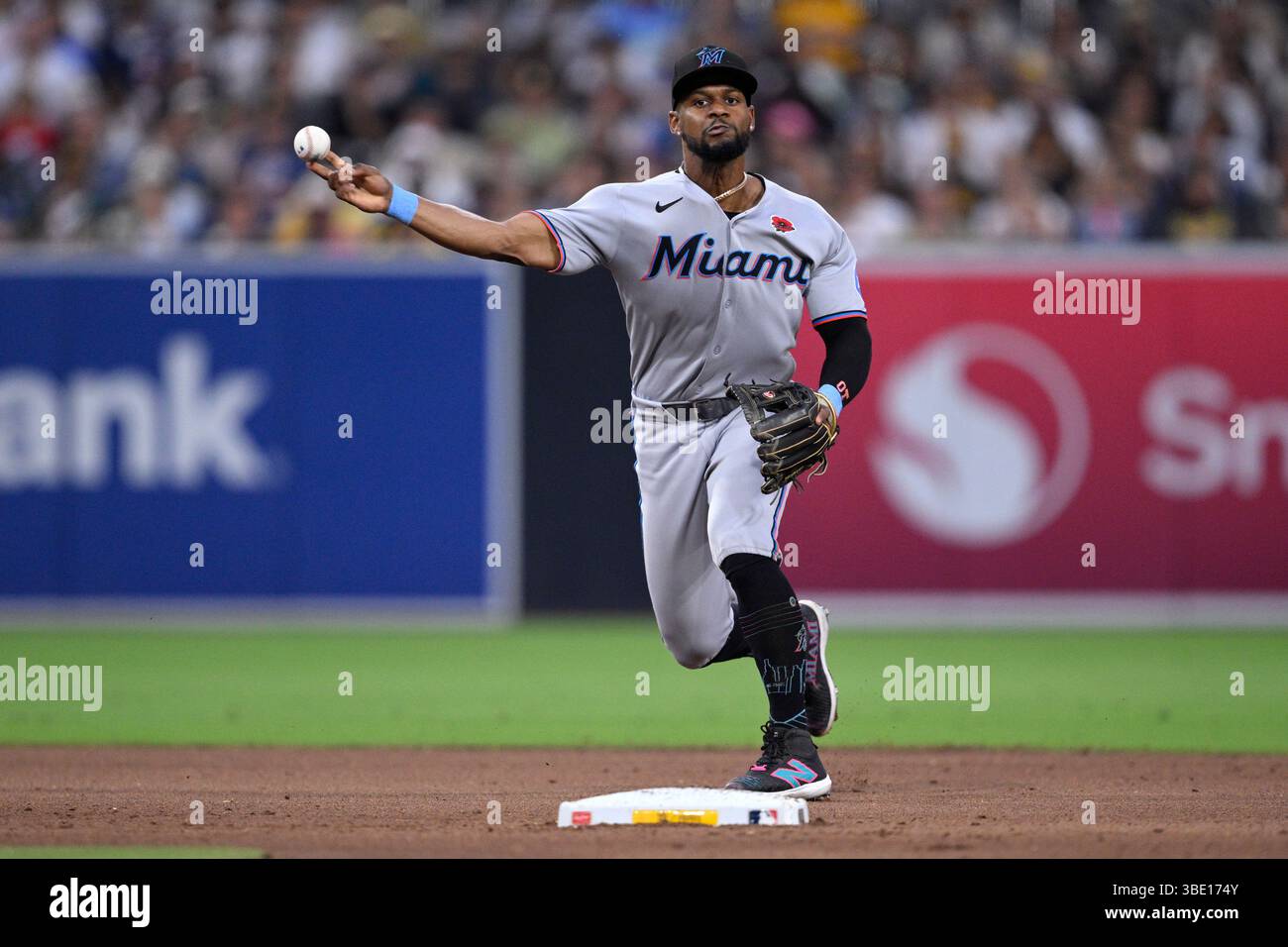 Miami Marlins shortstop Otto Lopez throws to first base on a groundout ...