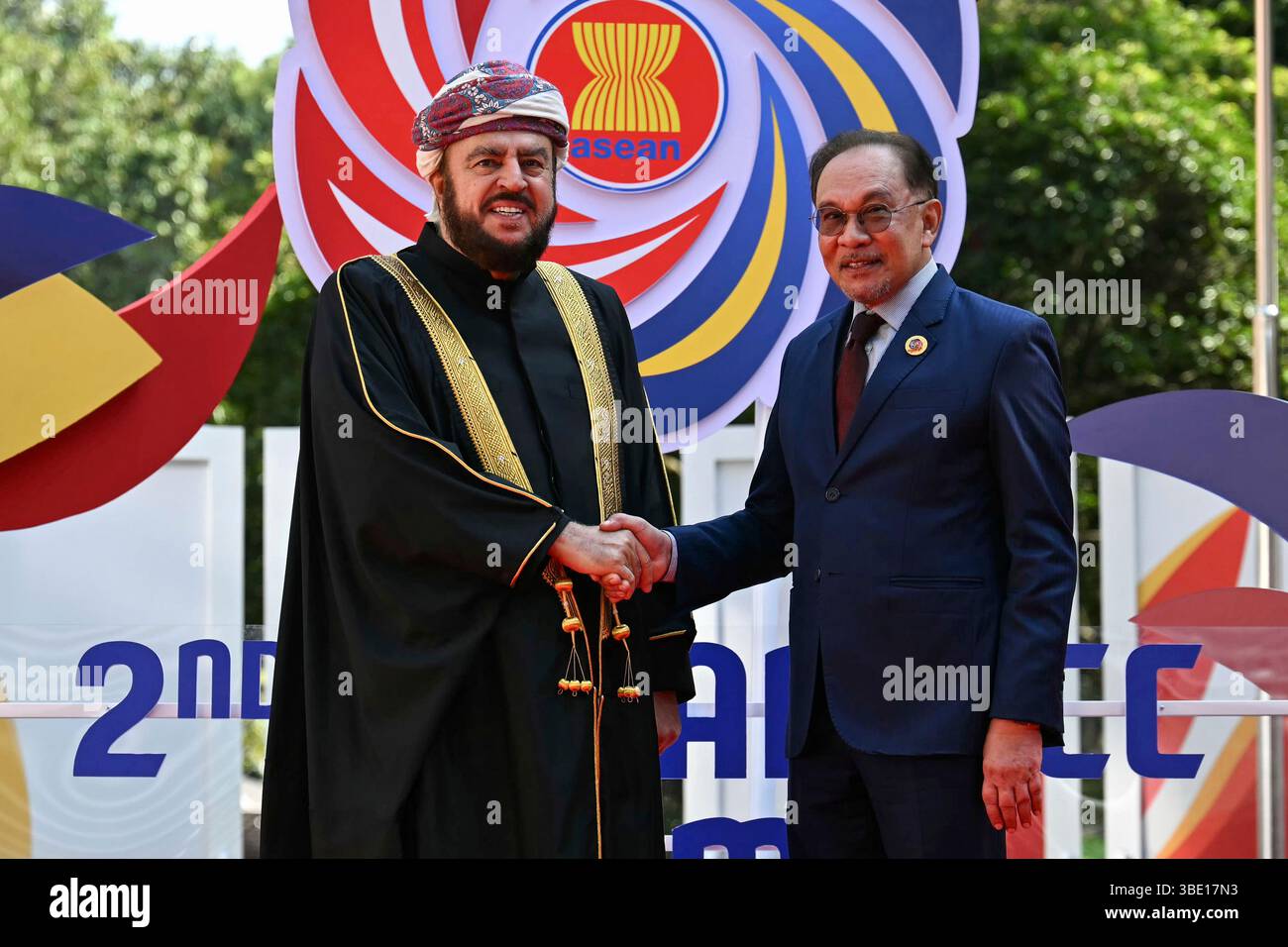 Malaysia's Prime Minister Anwar Ibrahim, right, greets Oman's Deputy ...