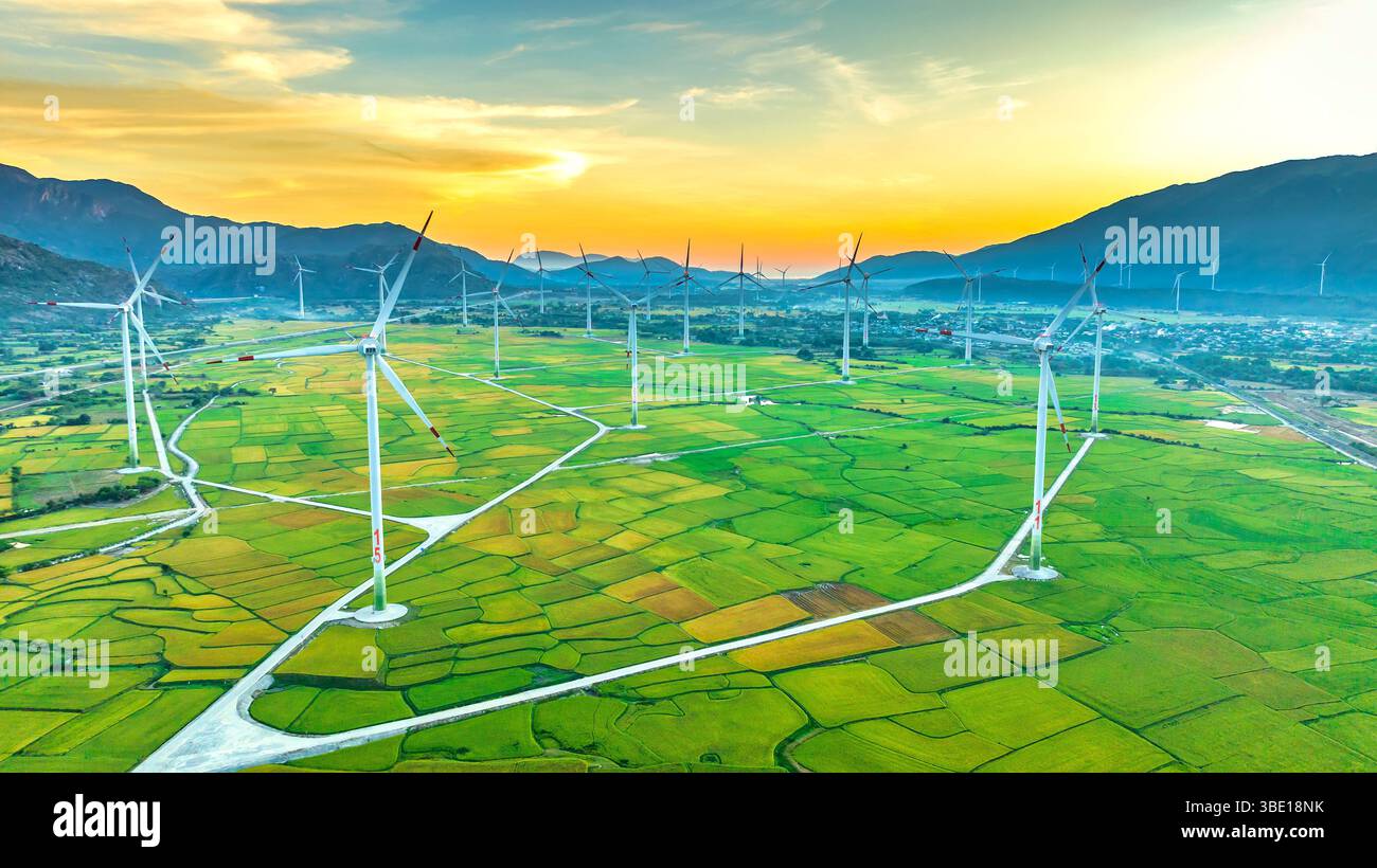 Panoramic view of wind farm or wind park. Wind turbines generating ...