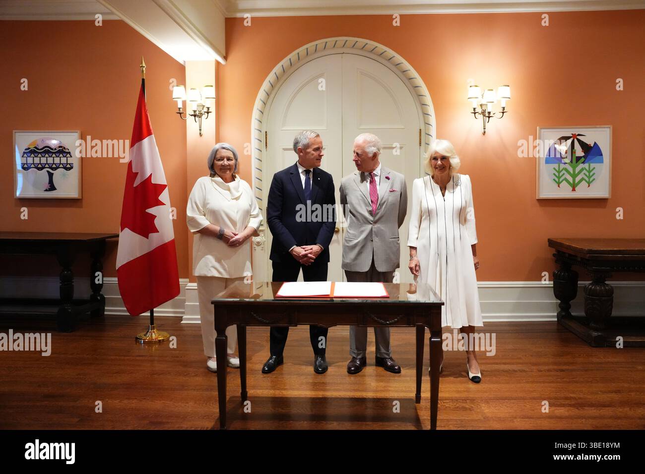 Ottawa, Canada. 26th May, 2025. Gov. Gen. Mary Simon, left to right, Prime Minister Mark Carney ...