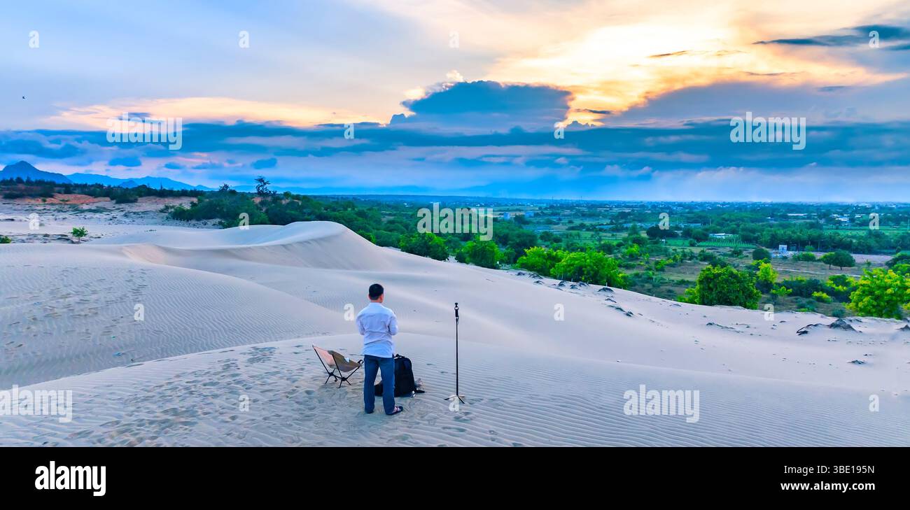 Ripples wave lead to peak of sand dunes under sunny blue cloud sky in ...
