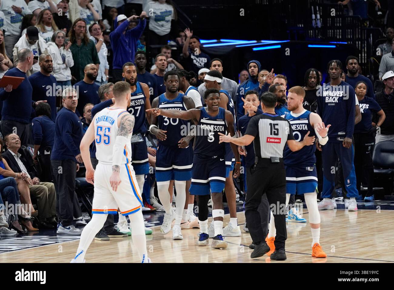 Minnesota Timberwolves guard Anthony Edwards (5) and teammates react ...