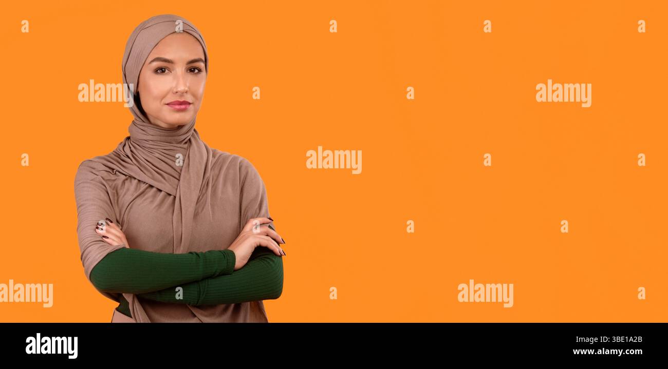 Successful Modern Muslim Woman In Hijab Posing Standing In Studio Stock ...