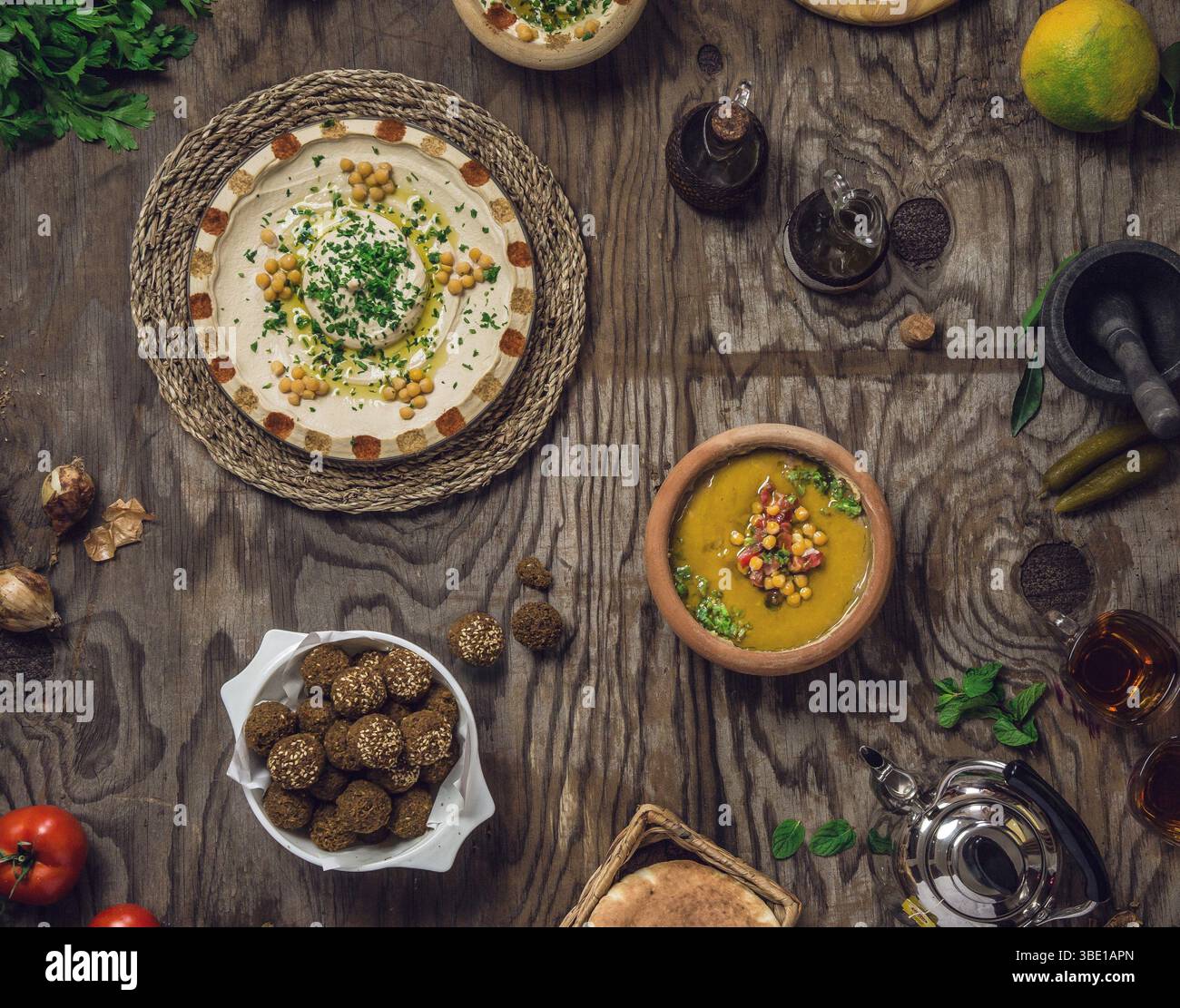 Traditional Arabic breakfast platter with falafel, hummus, and fava ...