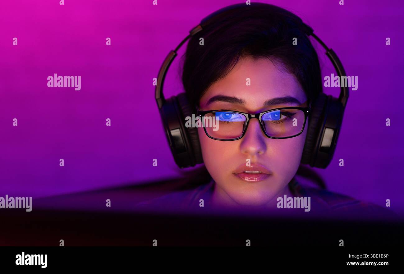 Professional Female Gamer Playing Online Videogame At Home, Low Light ...