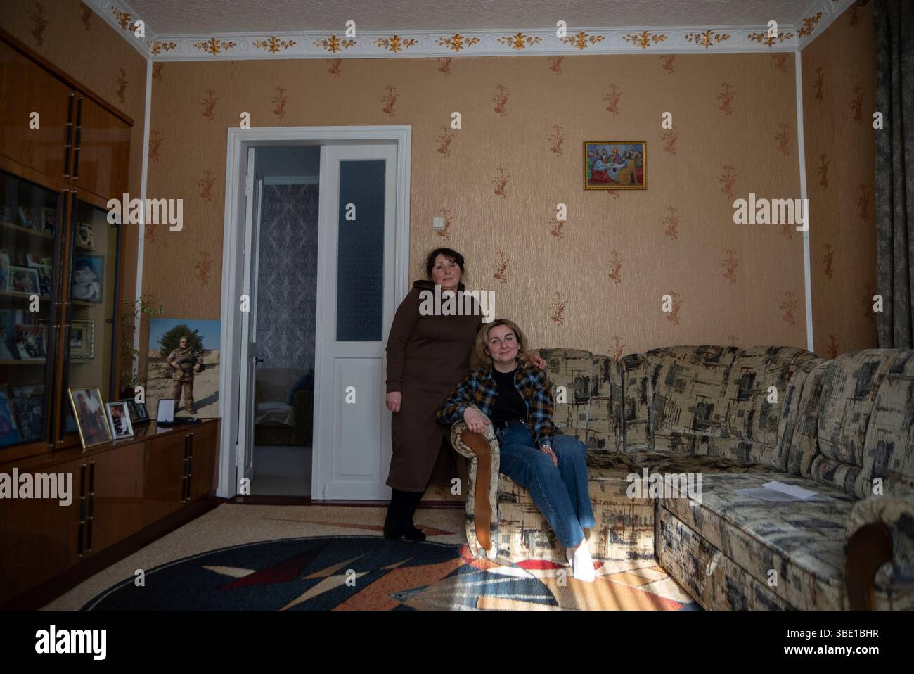 Halyna Hryhorieva, left, and her daughter, Oksana Hryhorieva, pose for a portrait in their house ...