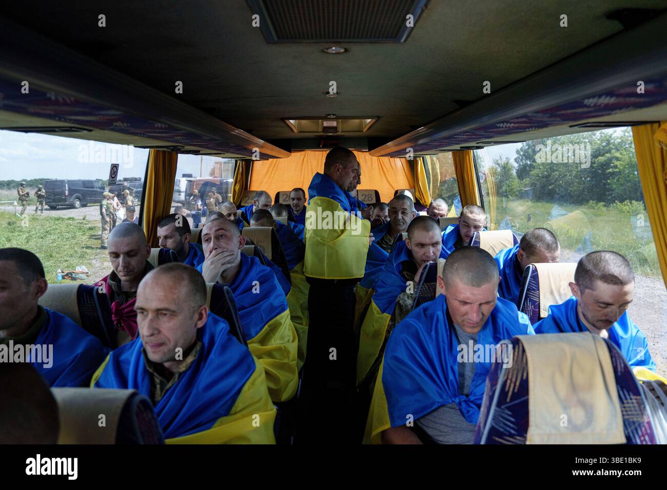 FILE - Ukrainian soldiers sit in a bus in the Sumy region of Ukraine ...