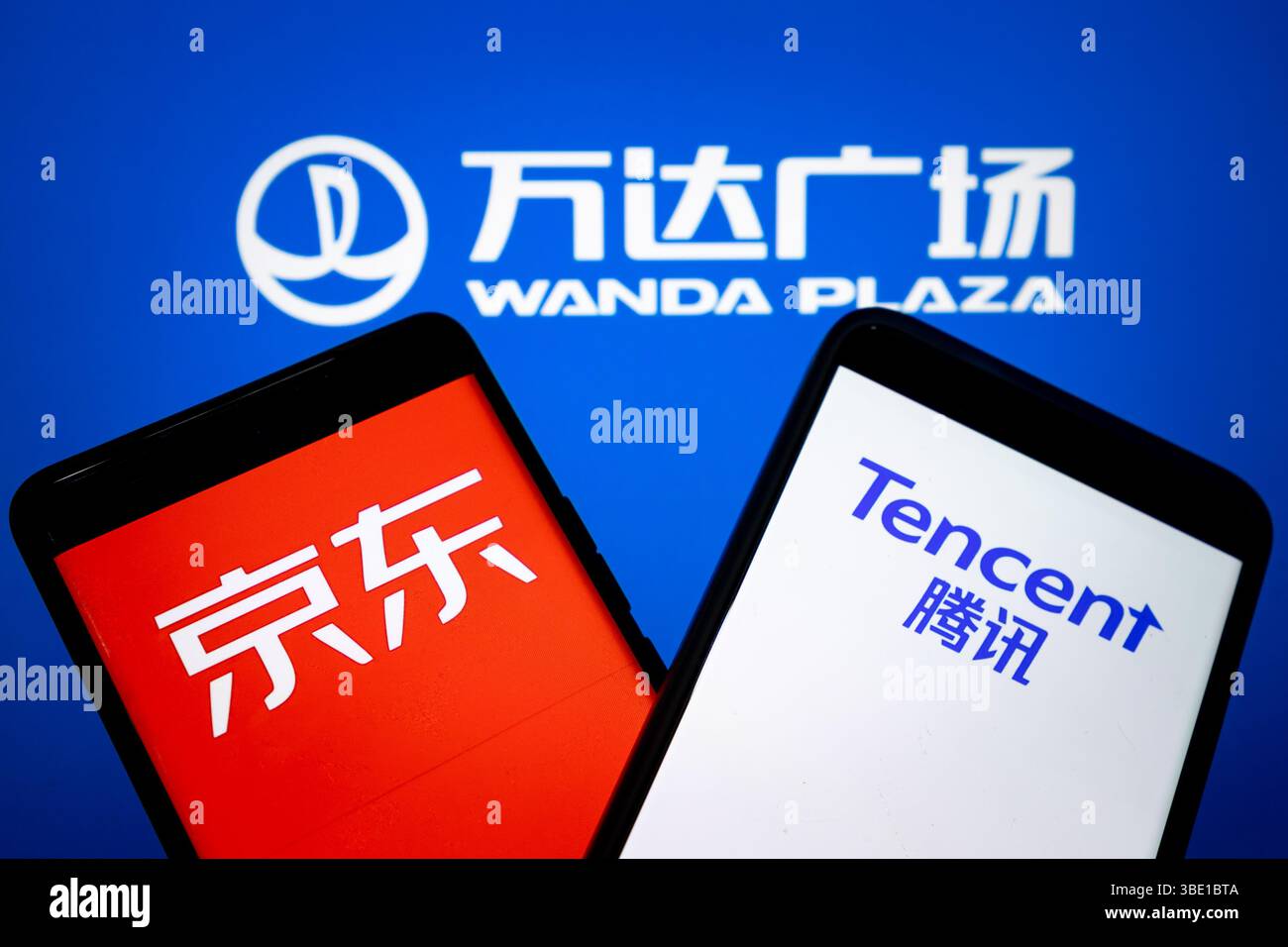 CHONGQING, CHINA - MAY 27, 2025 - An illustration photo shows the logos of JD.com and Tencent ...