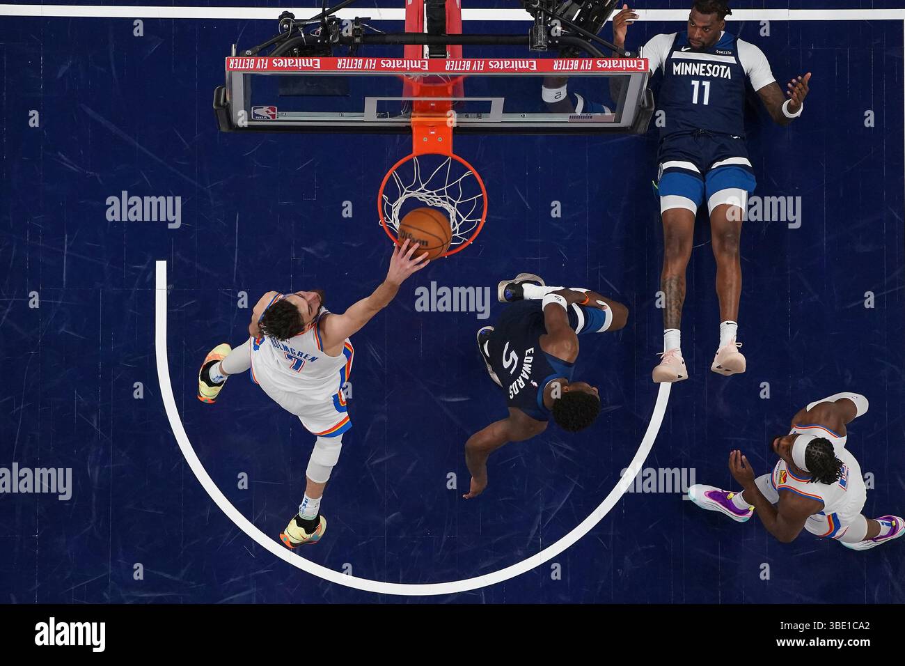 Oklahoma City Thunder forward Chet Holmgren (7) dunks next to Minnesota ...