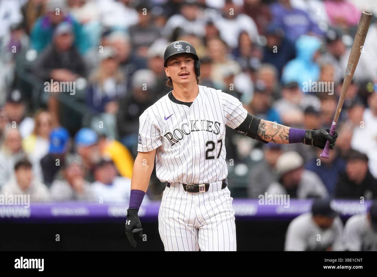 Colorado Rockies left fielder Jordan Beck (27) reacts after striking ...