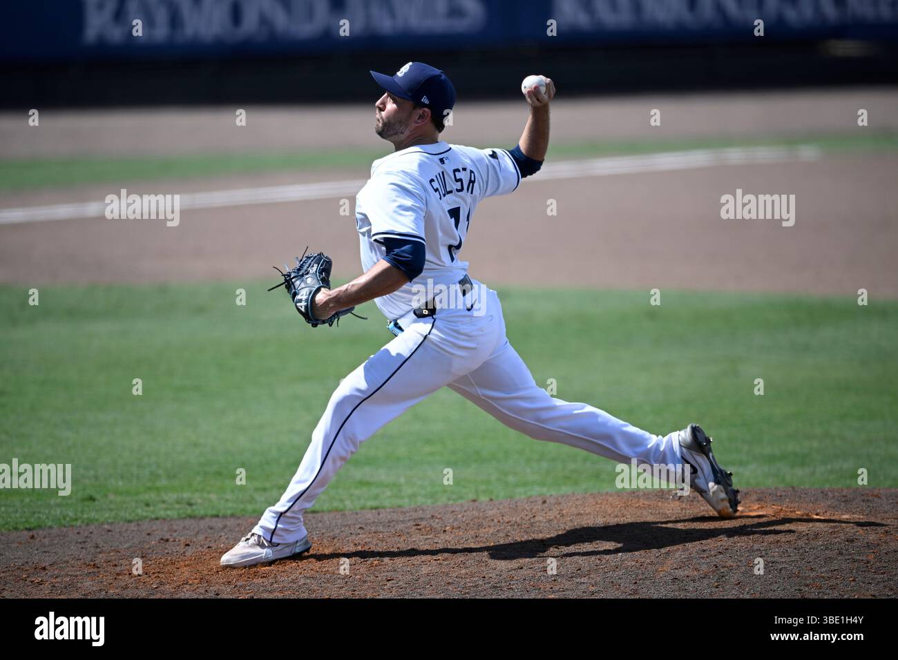 Tampa Bay Rays pitcher Cole Sulser (71) throws to home plate during the ...