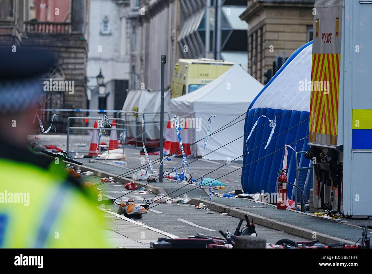 Police tents surrounded by debris at the scene in Water Street near the ...