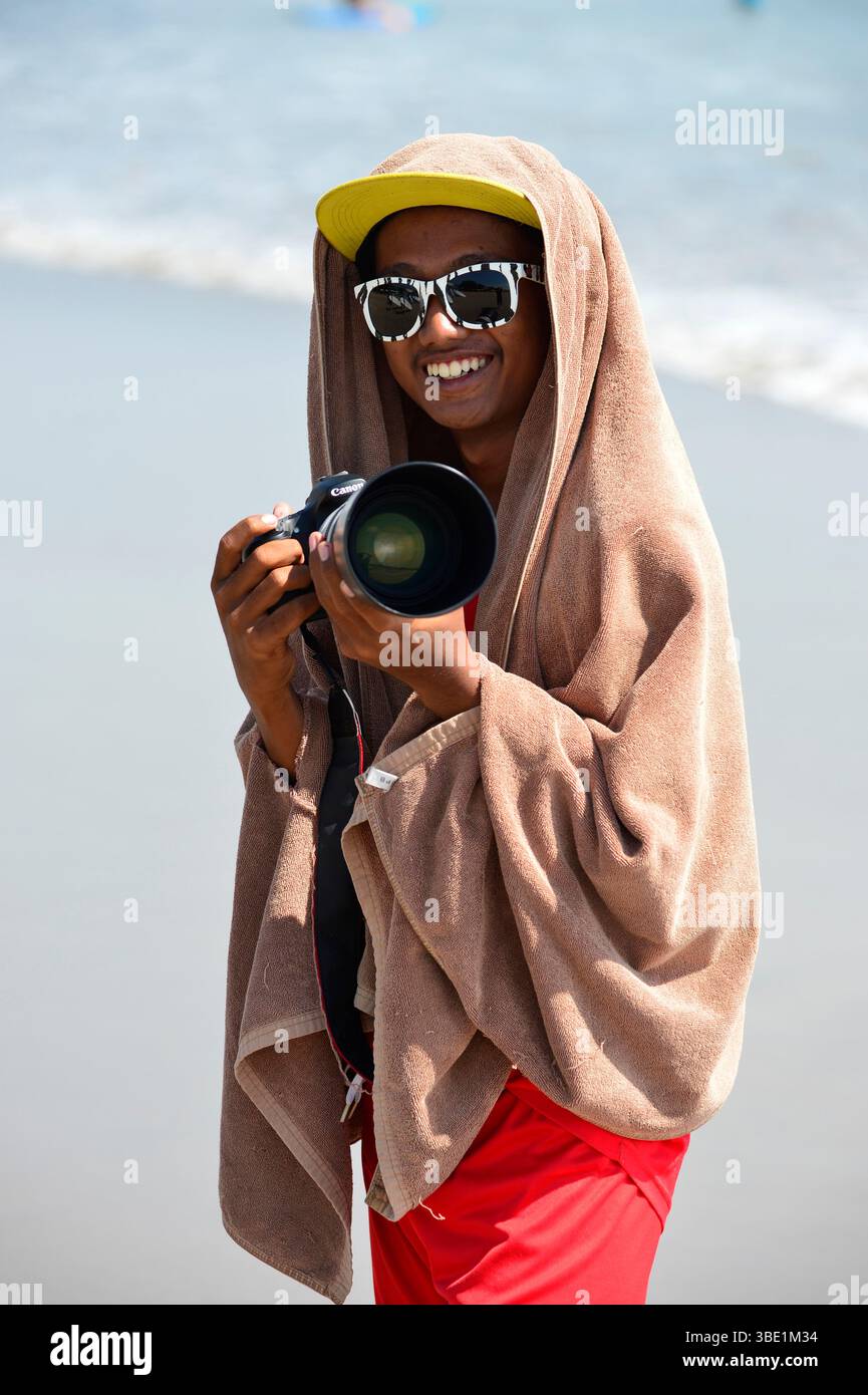 Portrait of indonesian photographer in Legian beach, Indonesia, South ...