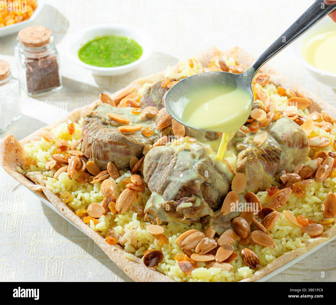 Jordanian Mansaf, served with jameed and lamb meat Stock Photo - Alamy