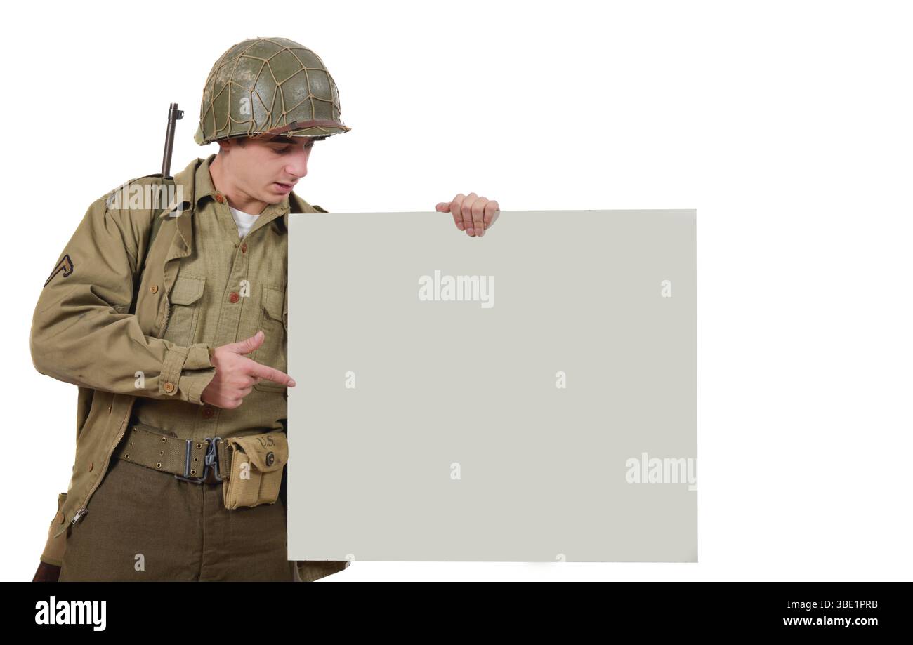 young American soldier with M1 helmet shows a signs Stock Photo - Alamy
