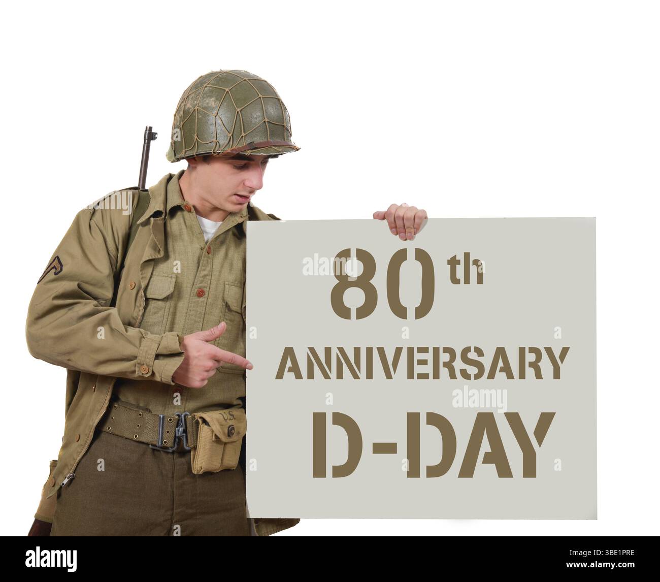 young American soldier with M1 helmet shows a signs 80 th anniversary ...