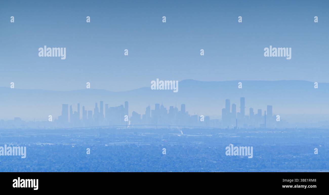 Melbourne city skyline high rise buildings in morning light blue sky ...