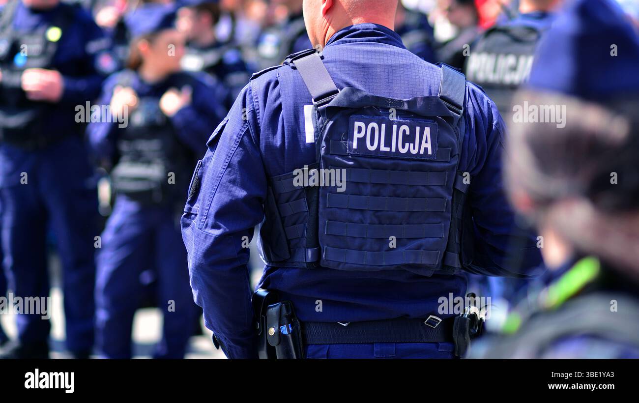 Police sign - logo on the back of the police uniform. Policja Stock ...