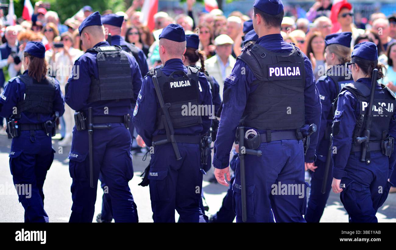 Police sign - logo on the back of the police uniform. Policja Stock ...