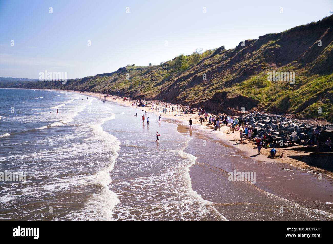 Filey bay looking south at nearly high tide Stock Photo - Alamy