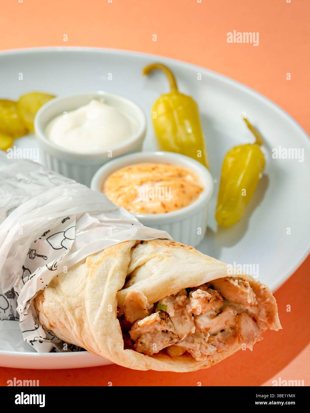 Close-Up of Chicken Shawarma Wrap with Garlic Sauce – Traditional ...