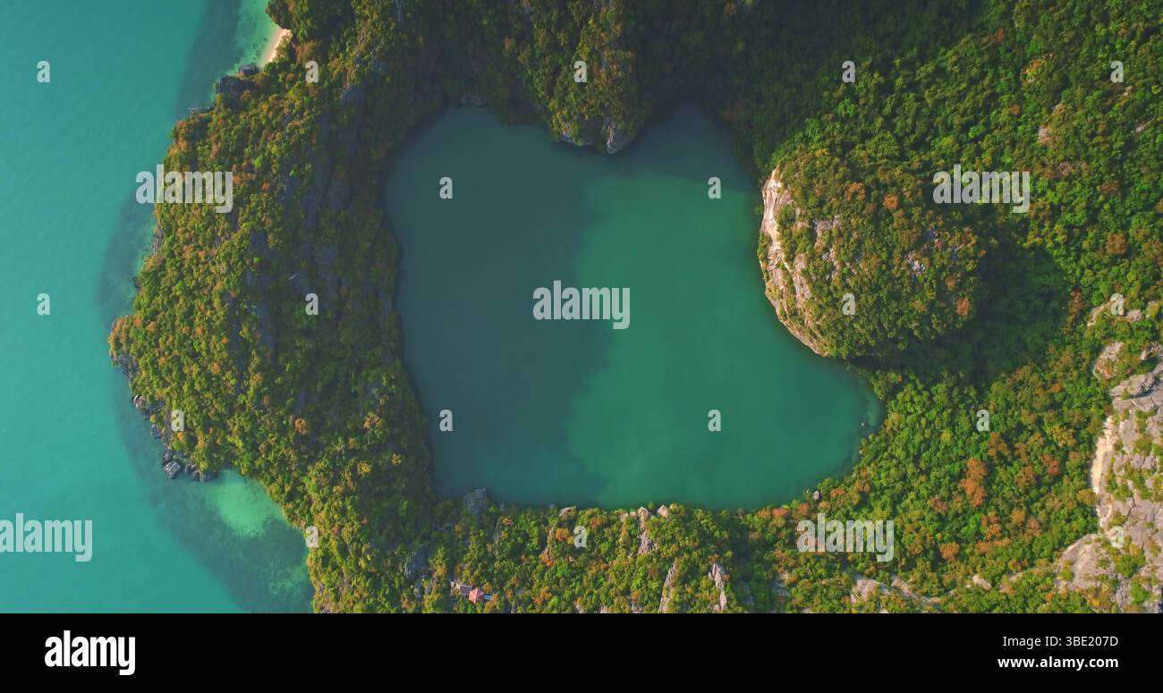 Aerial view capturing Thale Nai lagoon, a turquoise saltwater lake on ...