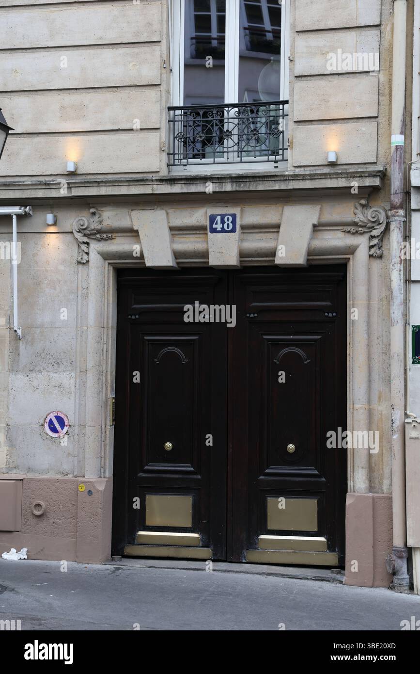 Elegant Parisian Building Entrance with Ornate Details and Number 48 ...