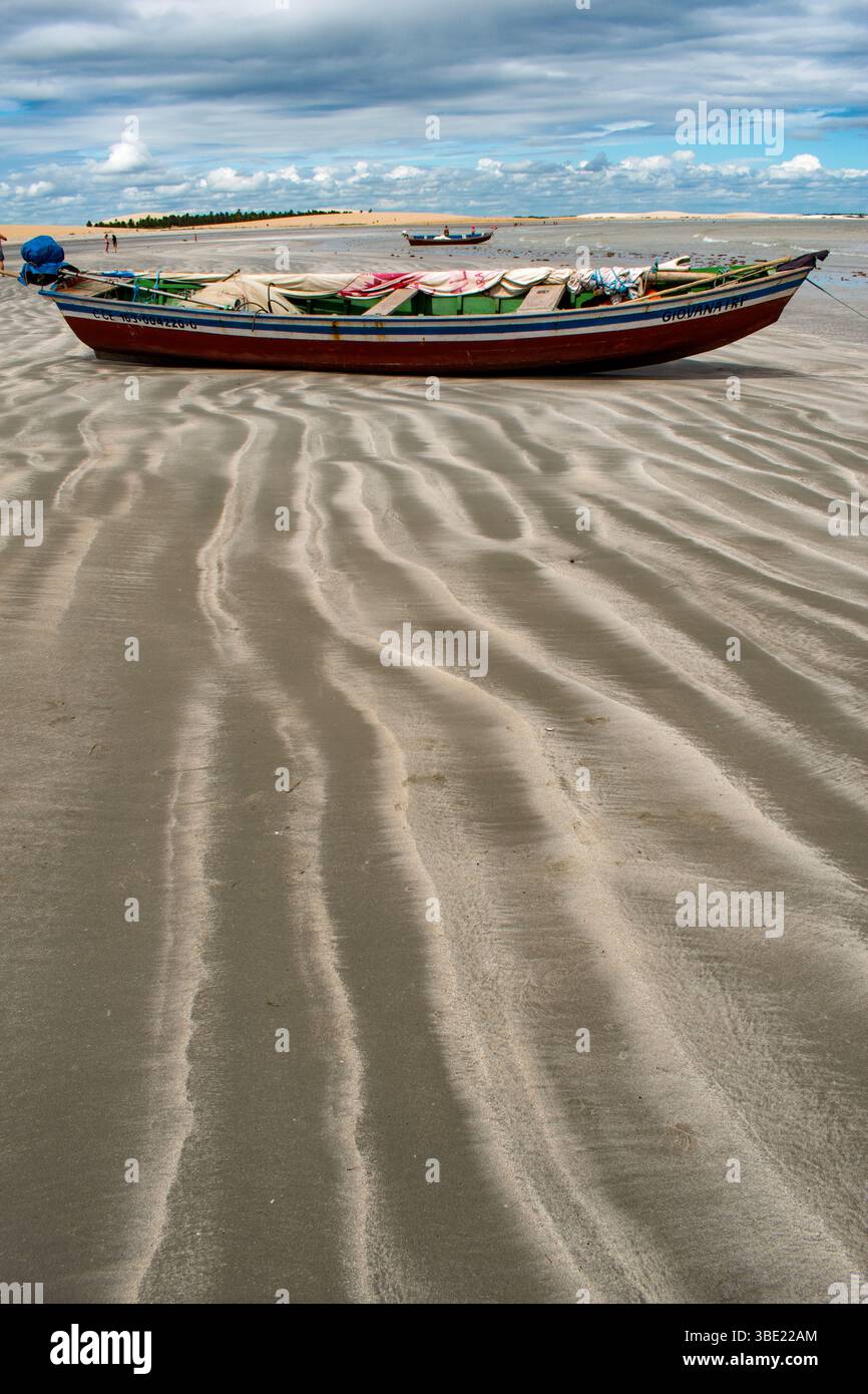 Brazil, South America: fishing boat and low tide on Praia Principal de ...
