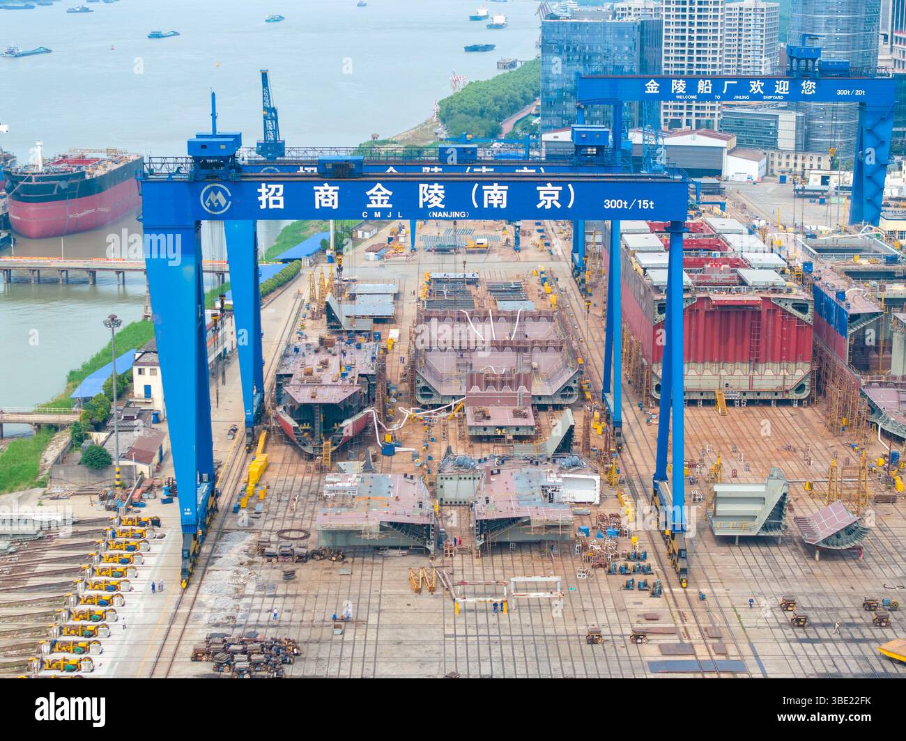 Nanjing, China. 27th May, 2025. Workers are manufacturing ships for ...