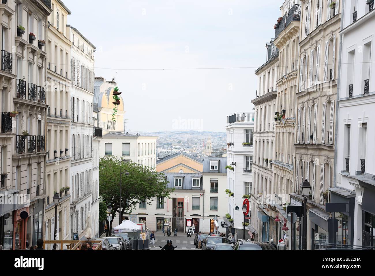 Classic Parisian Street View with Haussmann Architecture and Distant ...