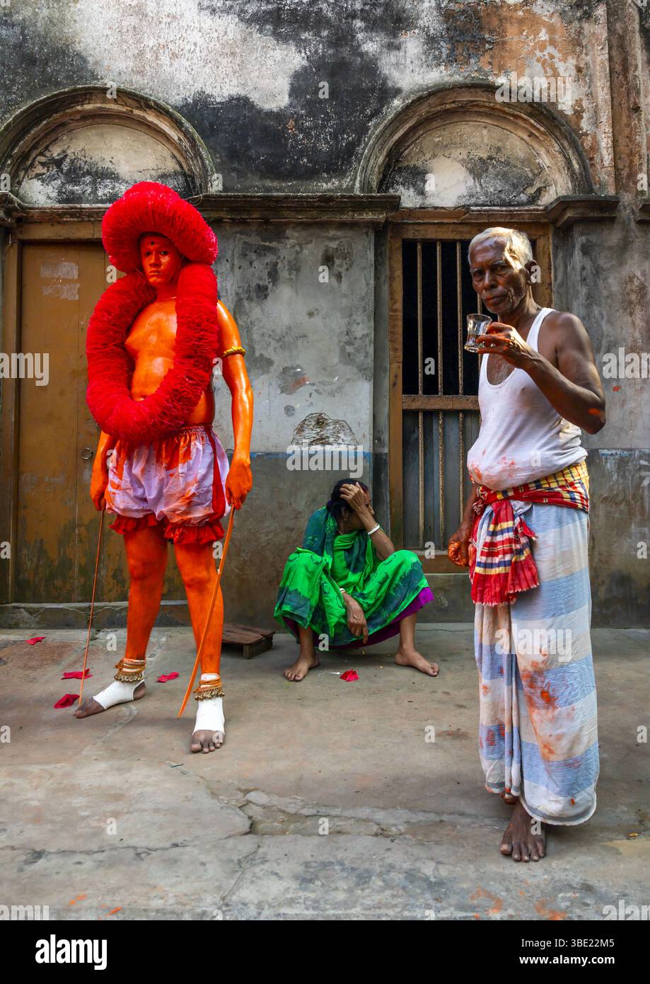 Hindu devotee covered with orange color at Lal Kach festival, Dhaka Division, Munshiganj ...