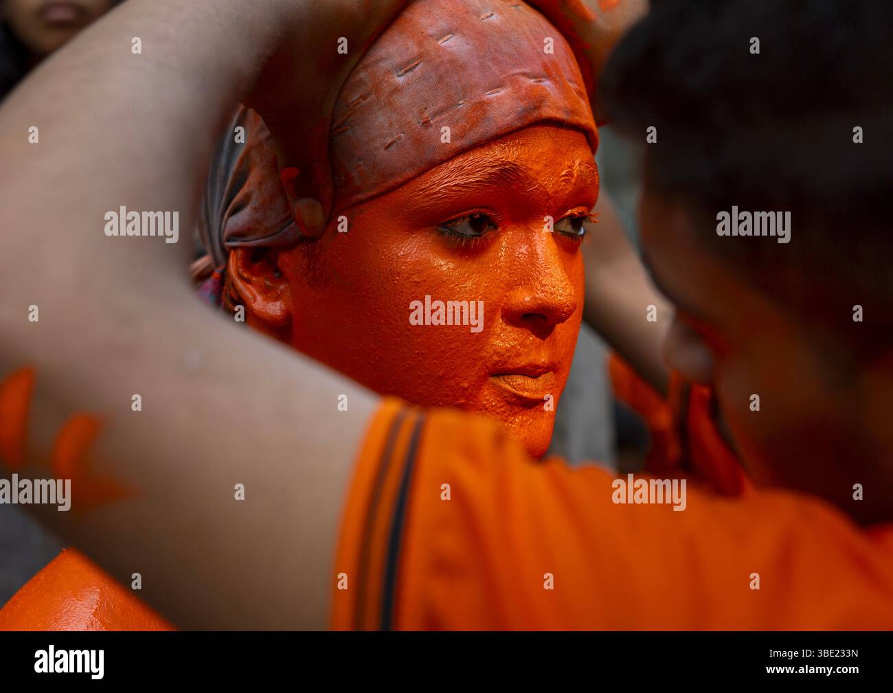 Make up of a Hindu devotee covered with orange color at Lal Kach ...