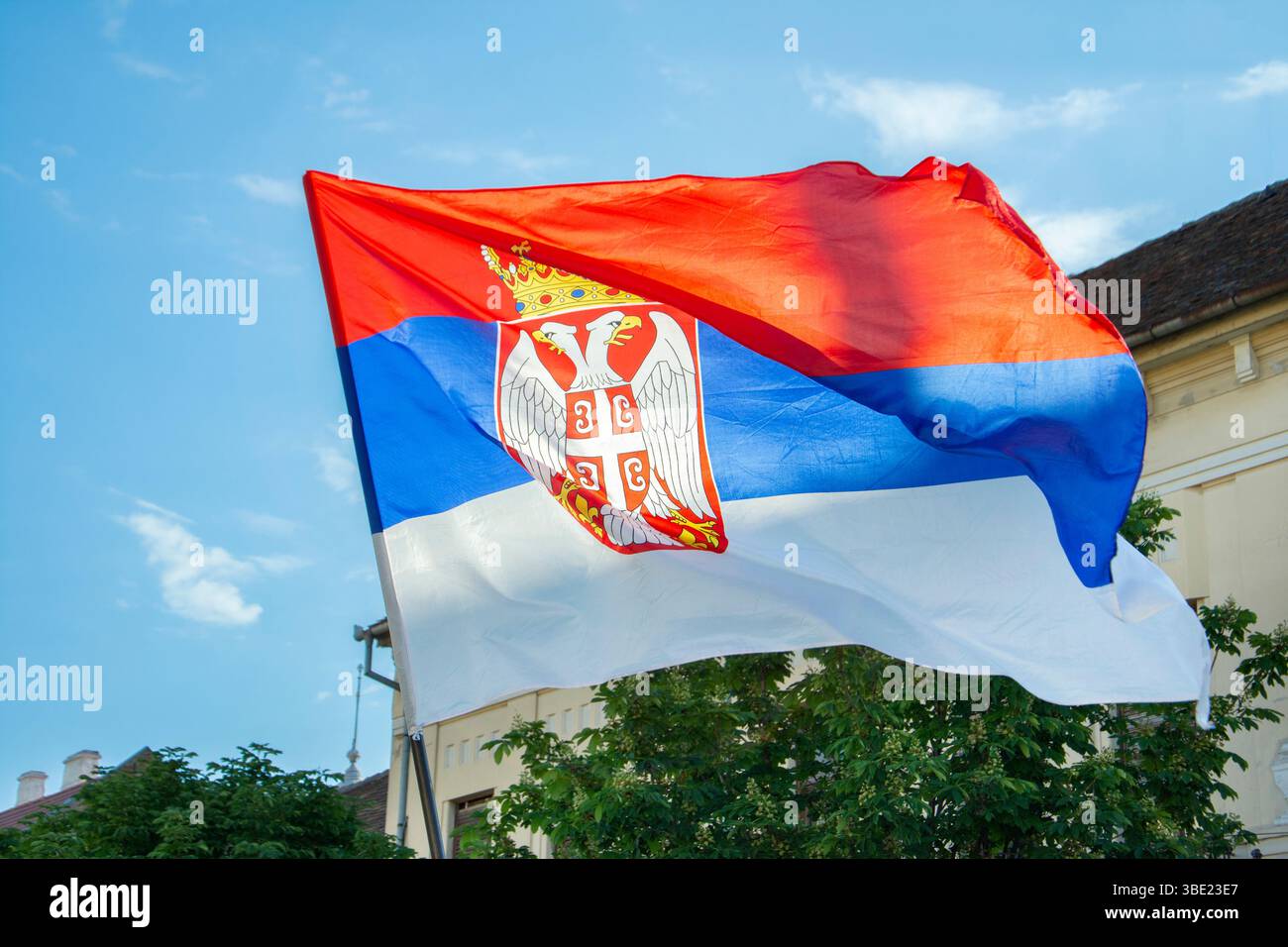 National flag of Serbia waving Stock Photo - Alamy