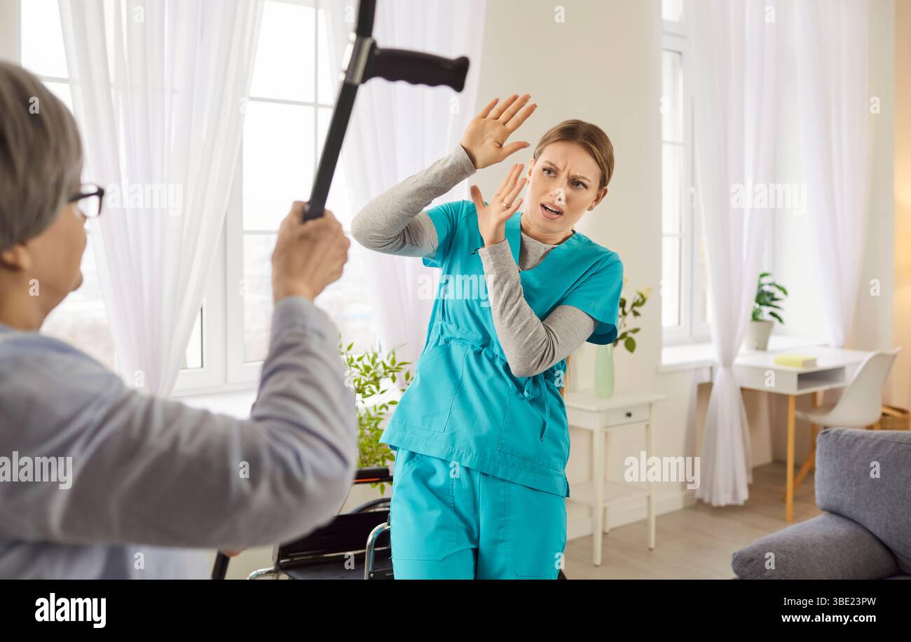 Old patient demonstrates her aggression towards nurse or caregiver ...
