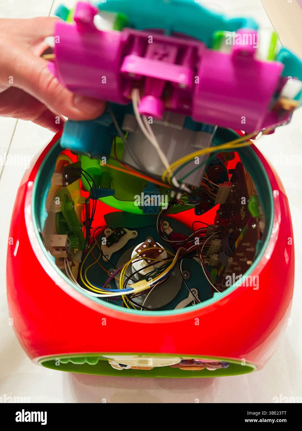 Electronic toy's interior with wiring and circuits exposed during ...