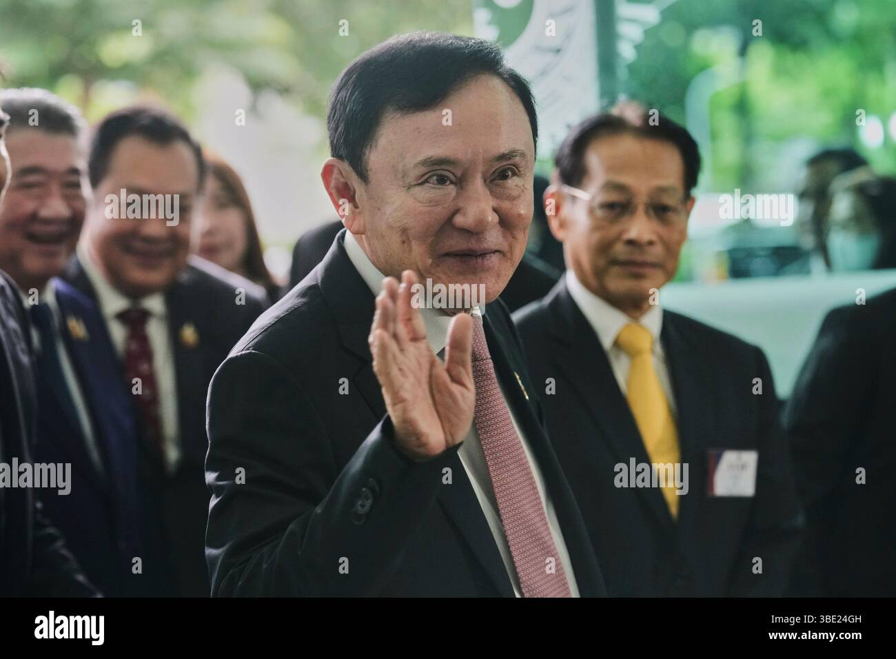 Former Thai Prime Minister Thaksin Shinawatra arrives at the office of ...