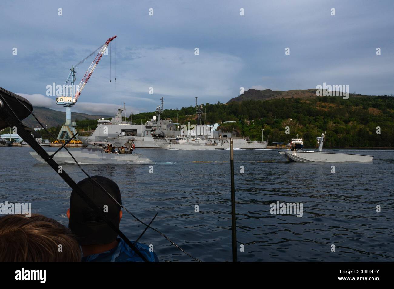 A U.S. Naval Special Warfare Combatant Craft Assault tows a MARTAC T-38 ...