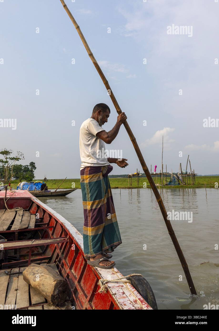 River gypsy man living on his boat on the river, Barisal Division, Barisal, Bangladesh Stock ...